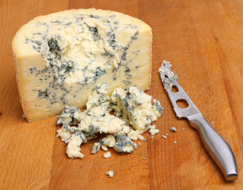 Stilton Cheese on Cheeseboard Stock Image - Image of rind, wooden: 33621635