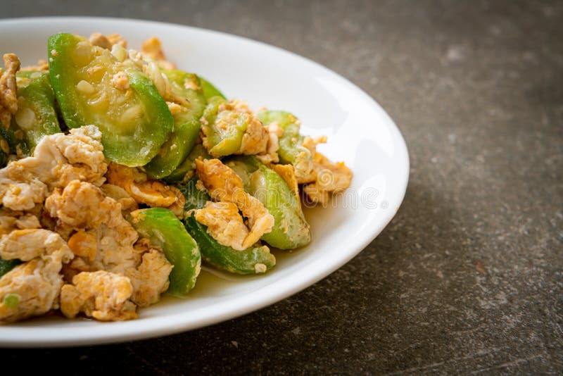 Stir Fried Angled Gourd with Egg Stock Image - Image of fried, cook ...