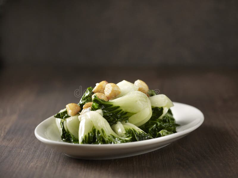 Stir-fried Baby Cabbage Served in a Dish Isolated on Mat Side View on ...