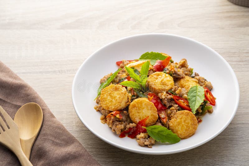 Stir Fried Basil with Minced Pork and Eggs Bean Curd in White Plate ...
