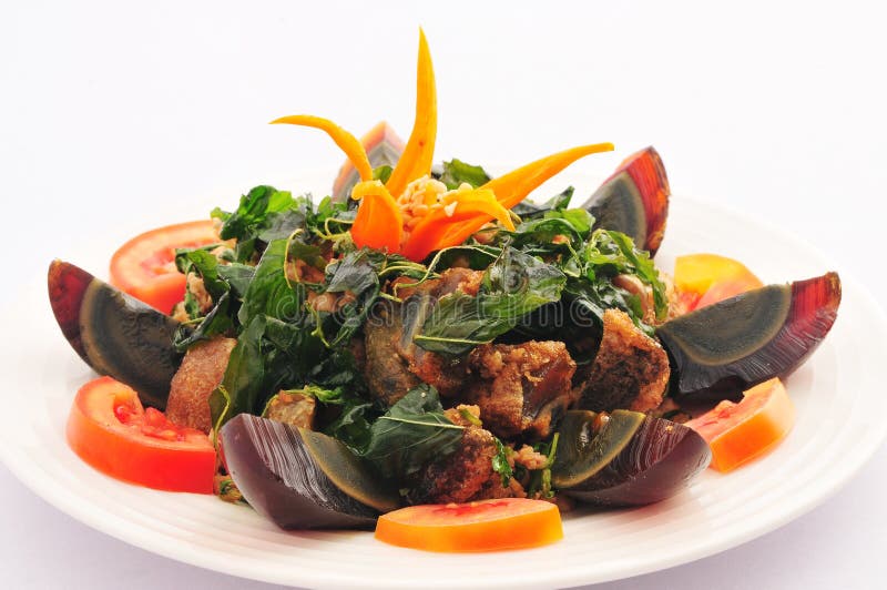 Stir Fried Crispy Basil with Black Preserved Egg, Stock Photo - Image ...