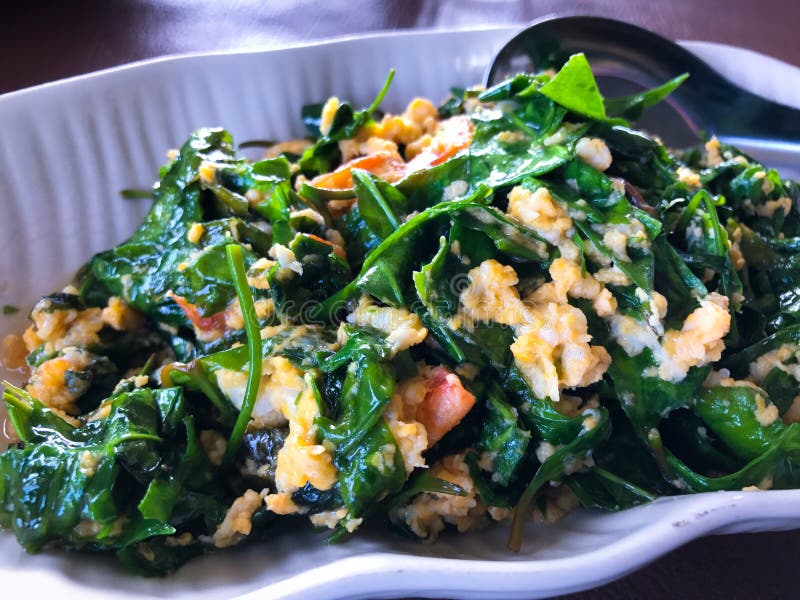 Stir Fried Gnetum Gnemon or Melinjo Leaves with Eggs Stock Image ...