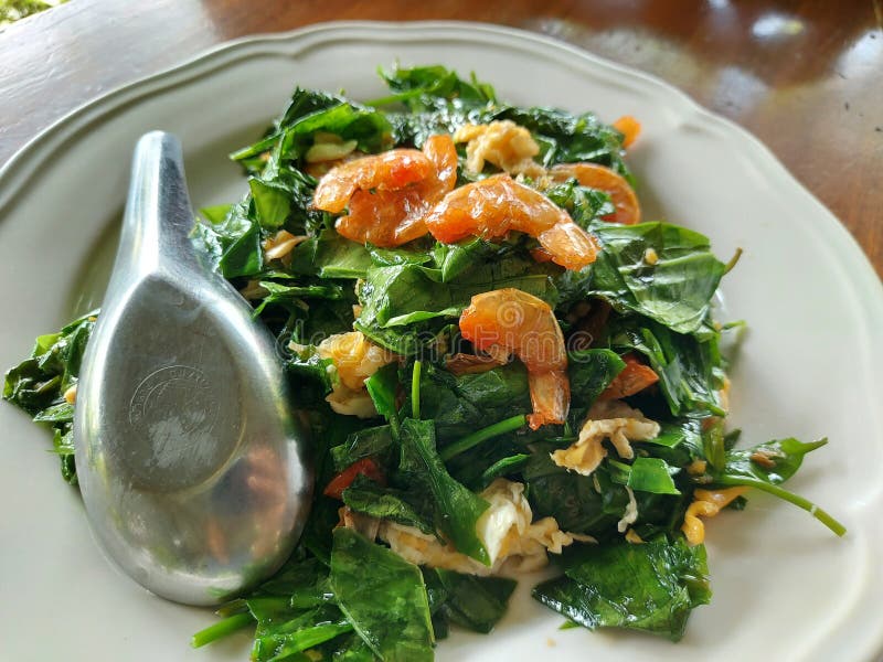 Stir-fried Malindjo Leaves with Little Prawns. Stock Image - Image of ...