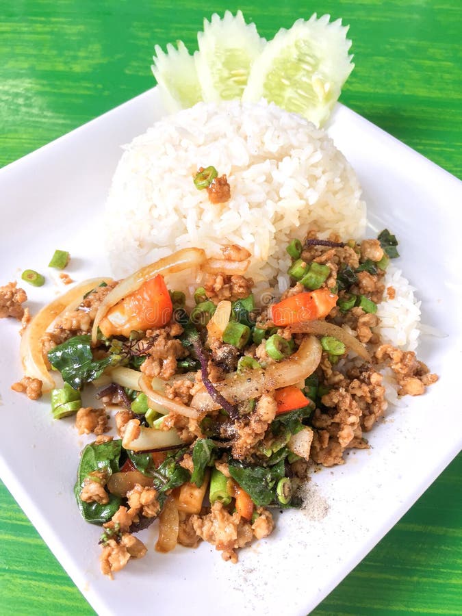 Stir-fried Pork and Basil Served with Rice Stock Image - Image of ...
