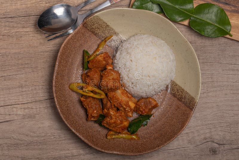 Stir-fried Pork Ribs with Curry Paste and Steamed Rice Stock Image ...
