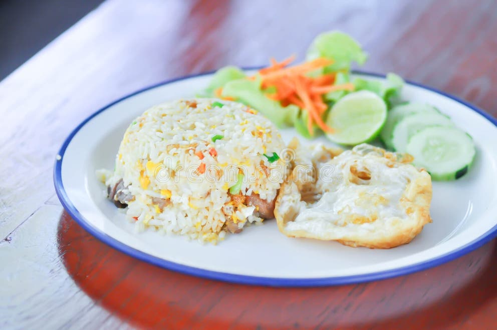 Stir Fried Rice or Fried Rice with Sunny Side Up Egg Stock Photo ...