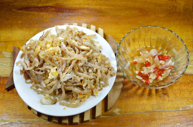 Stir Fried Slice Sweet Pickled Turnip with Egg and Fish Sauce Cup Stock ...