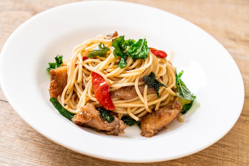 Stir-fried Spaghetti with Chicken and Basil Stock Image - Image of ...