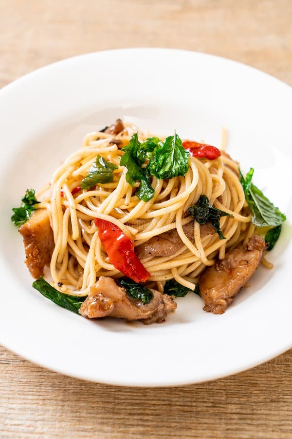 Stir-fried Spaghetti with Chicken and Basil Stock Image - Image of food ...