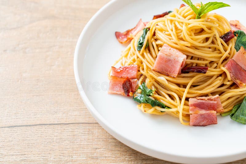 Stir-Fried Spaghetti with Dried Chili and Bacon Stock Photo - Image of ...