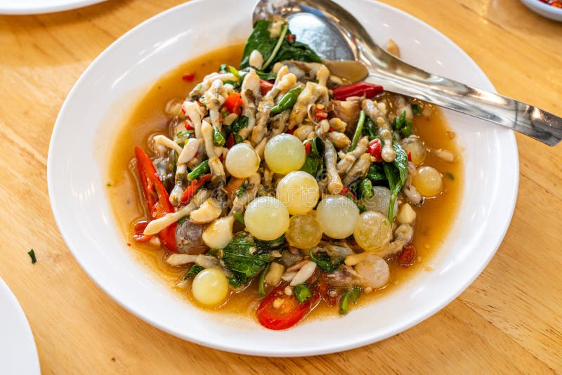 Stir Fried Spicy Catfish Roe and Razor with Thai Herbs Stock Image ...