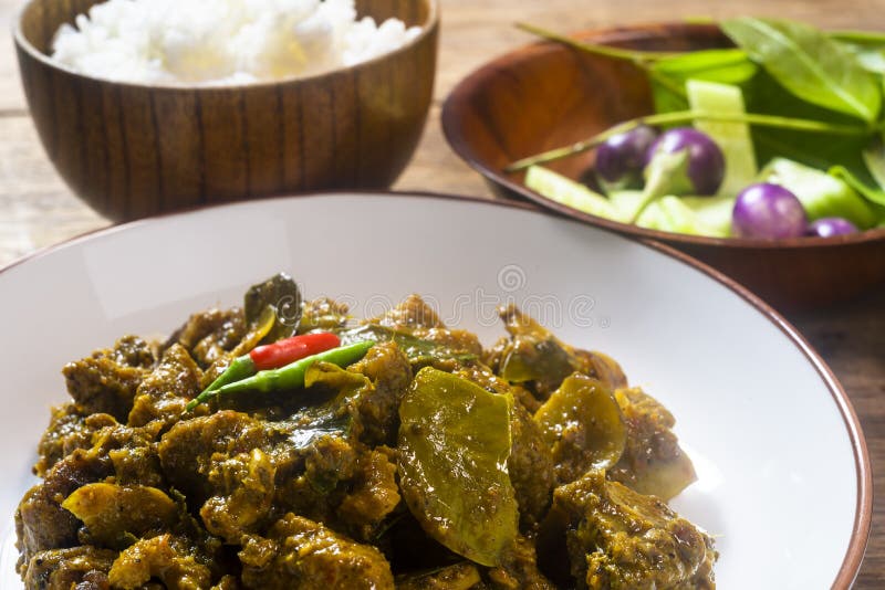 Stir-fried Spicy Duck Curry Paste on a Wooden Table. Ready To Eat ...