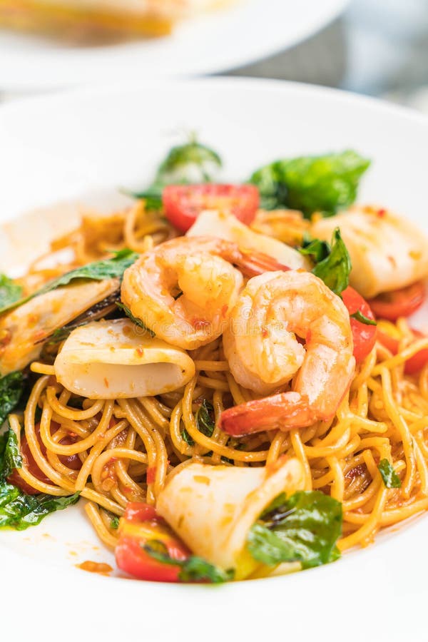 Stir-fried Spicy Seafood Spaghetti Stock Photo - Image of alfresco ... Stir-fried Spicy Seafood Spaghetti Stock Photo - Image of alfresco ...