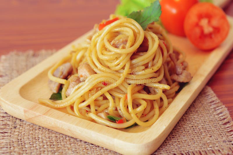 Stir-fried Spicy Spaghetti with Chicken. Thai Style Stock Photo - Image ...