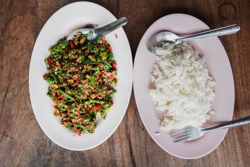 Stir Fried Thai Basil with Minced Pork and Chilli and Rice Stock Photo ...