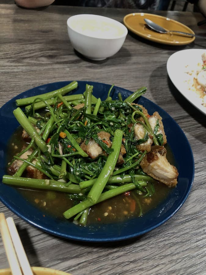 Stir-fried Morning Glory with Crispy Pork (Pad Pak Boong Moo Krob ...
