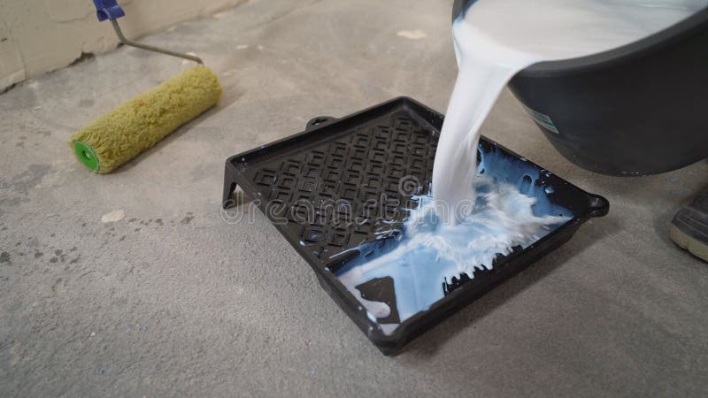 Stir the White Primer To the Desired Consistency. Water is Poured into ...