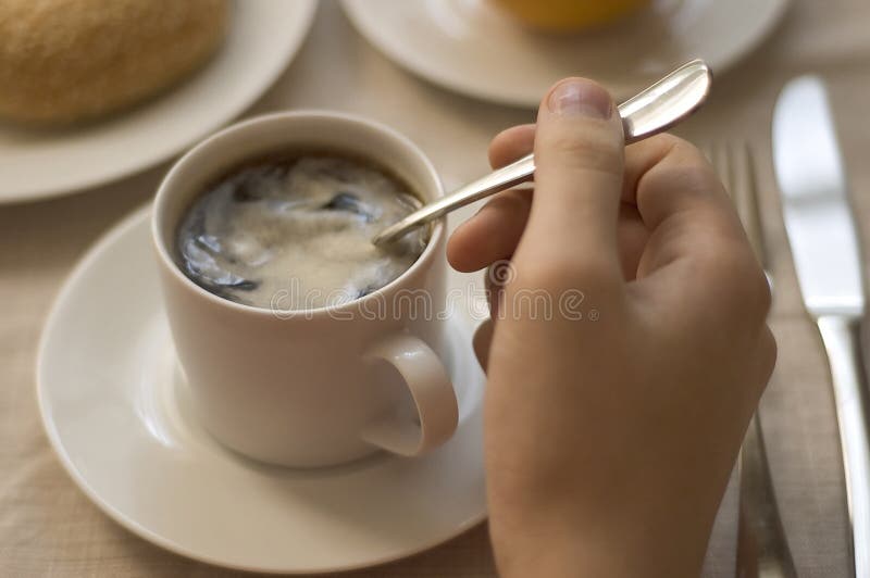 Stirring coffee stock photo. Image of beverage, coffee - 206542
