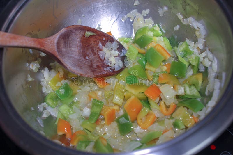 Stirring a Salsa with a Wooden Spoon Stock Photo - Image of color, food ...