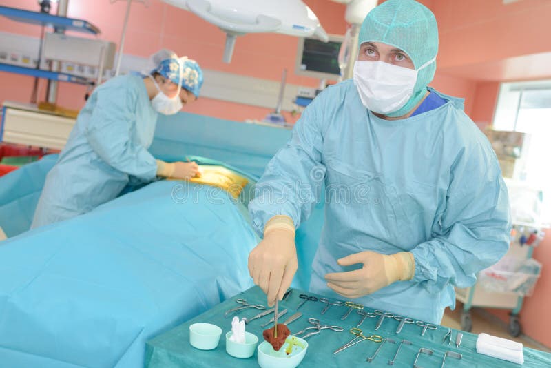 Stitching after Complex and Bloody Surgery Stock Photo - Image of ...