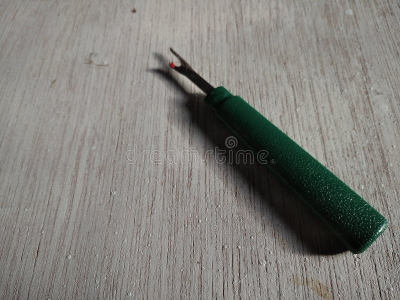 Green Stitching on a White Wooden Background Stock Image - Image of ...