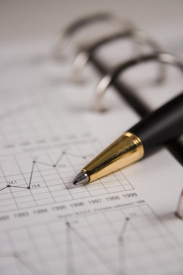 Stock chart with a pen stock photo. Image of market, organization - 3973360