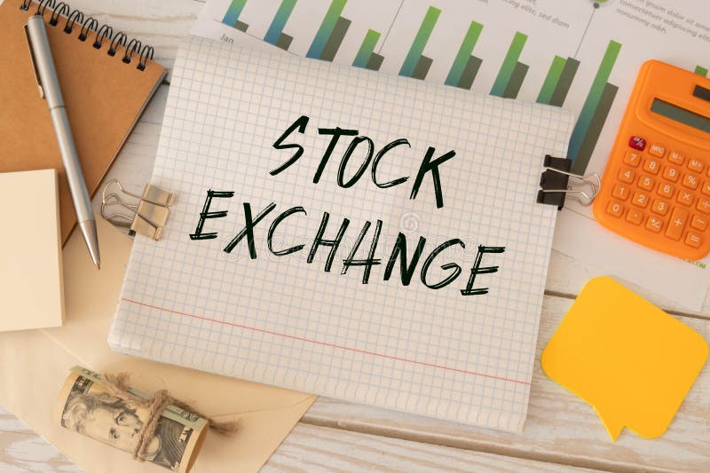 Stock Exchange Written on Newspaper on Keyboard Stock Photo - Image of ...