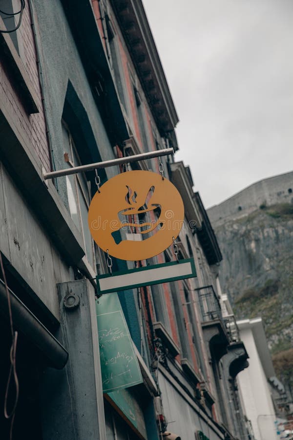 Stylish Café Signboard in Dinant, Belgium with Iconic Symbol Editorial ...