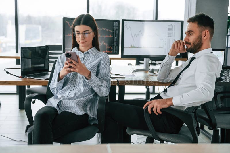 Stock Information Using Smartphone Two Employees Working Office ...