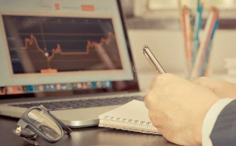 Stock Market Broker is Taking Note on Stock Analysis Stock Photo ...