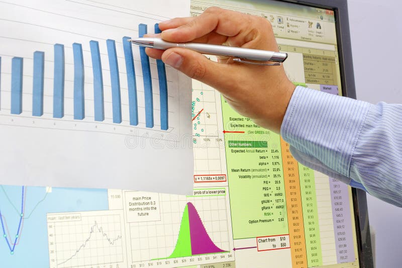 Stock Market Charts and Graphs with Pan on Hand Stock Image - Image of ...