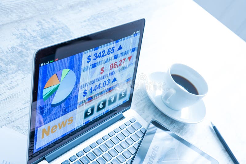 Stock Market Trading App on a Tablet PC and Laptop PC Stock Photo ...