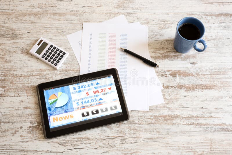 Stock Market Trading App on a Tablet PC and Laptop PC Stock Image ...