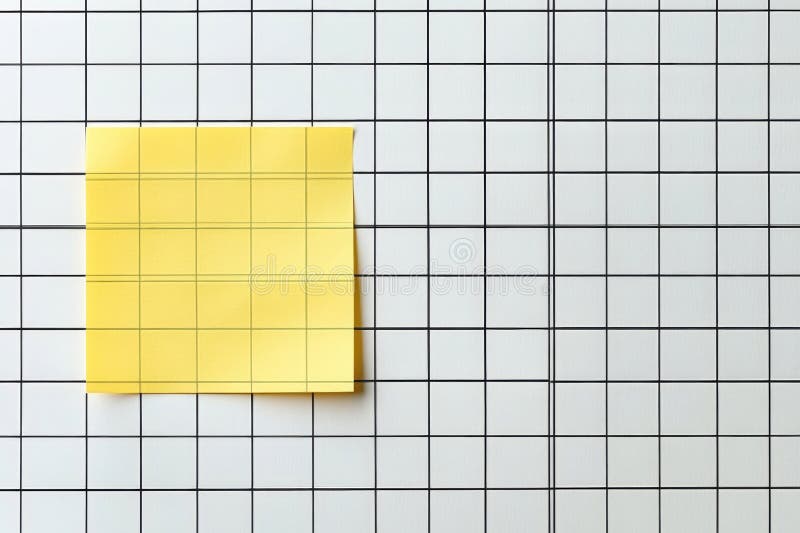 Stock Photo of a Yellow Sticky Note Against a White Background in High ...