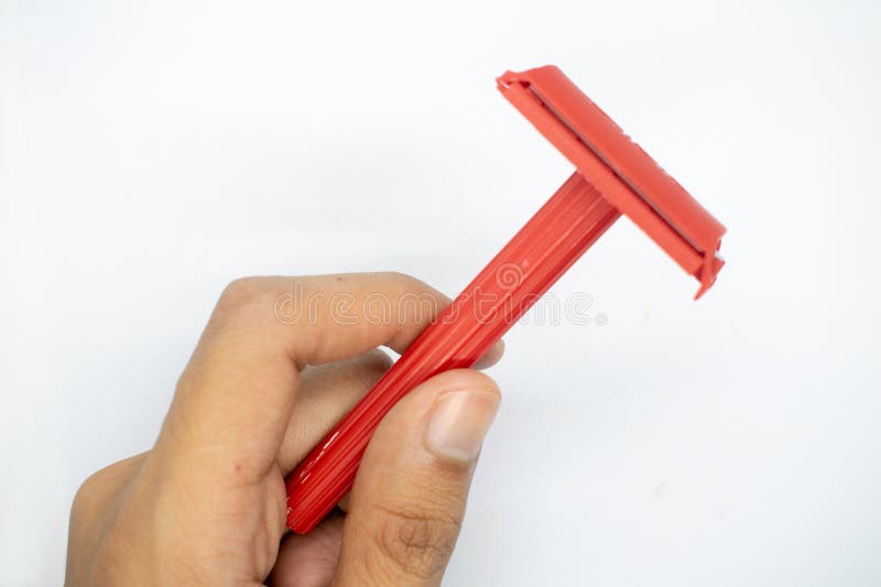 Hand Holding a Razor on a White Background Stock Photo - Image of ...