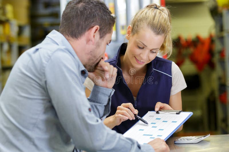 Supervisor Showing Apprentices How To Use Wallpaper Brush Stock Photo ...