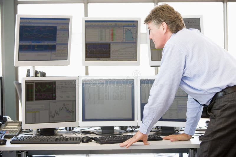 Stock Trader Examining Computer Monitors Stock Photo - Image of ...