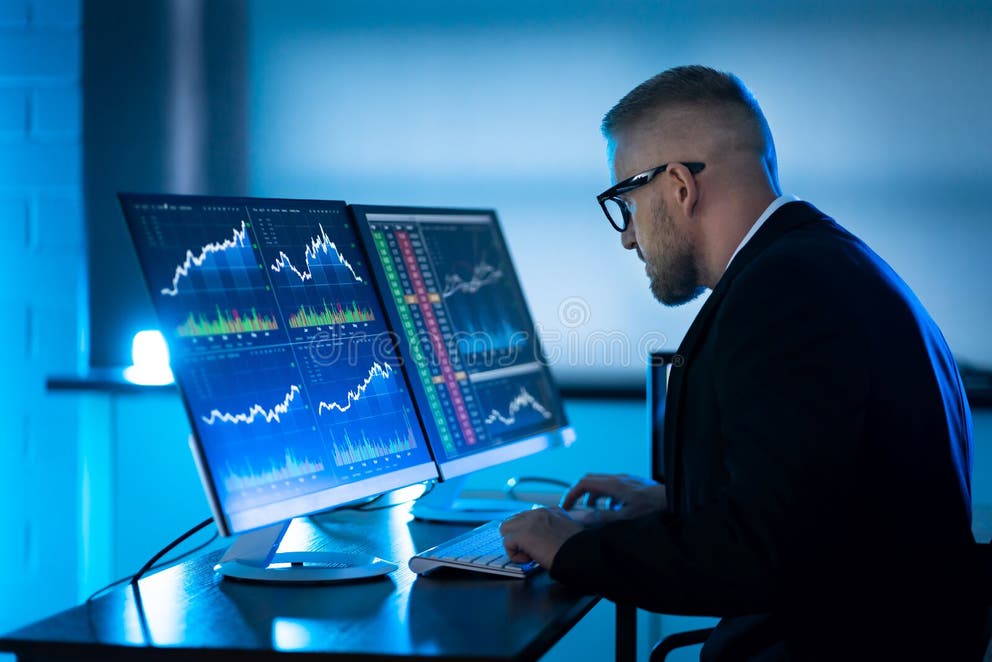 Stock Trader Man Using Multiple Computers Stock Image - Image of screen, monitor: 238298743