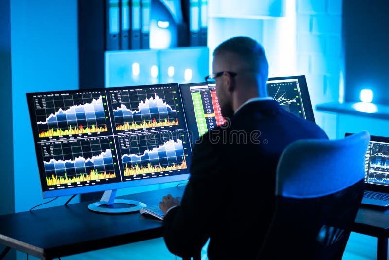 Stock Trader Man Using Multiple Computers Stock Image - Image of ...