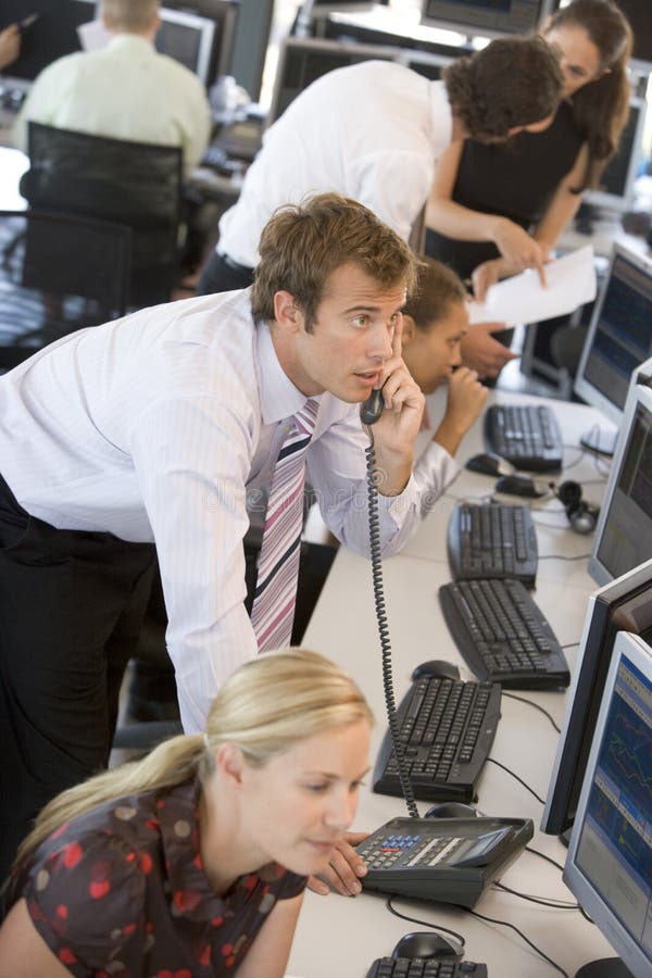 Stock Trader Looking at Multiple Monitors Stock Image - Image of rear ...