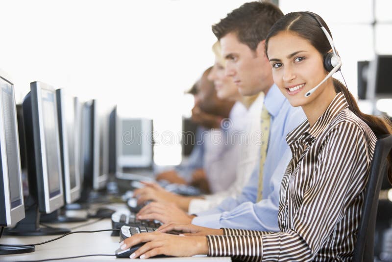 Four Peolple in a Call Center Stock Photo - Image of businesswoman ...