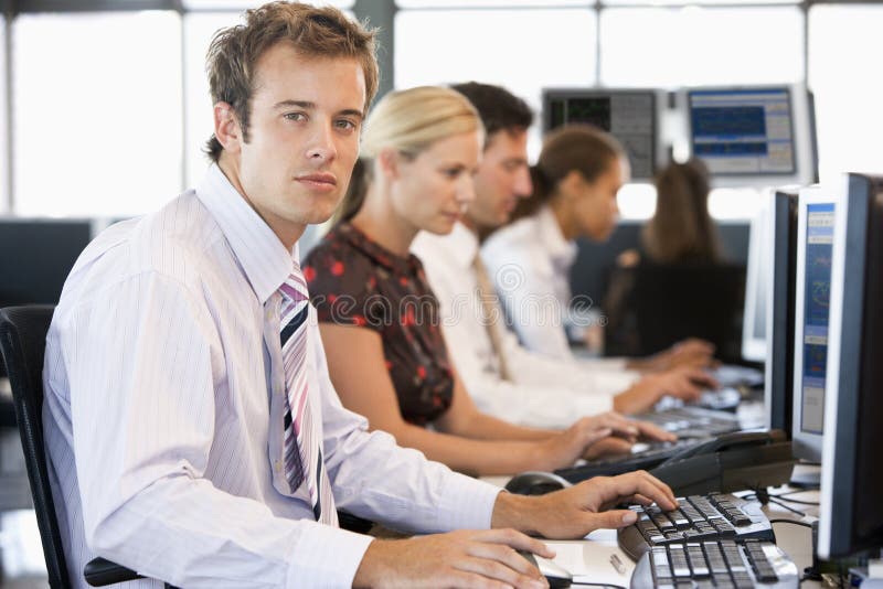 Stock Traders in a Meeting stock image. Image of concentration - 10400275