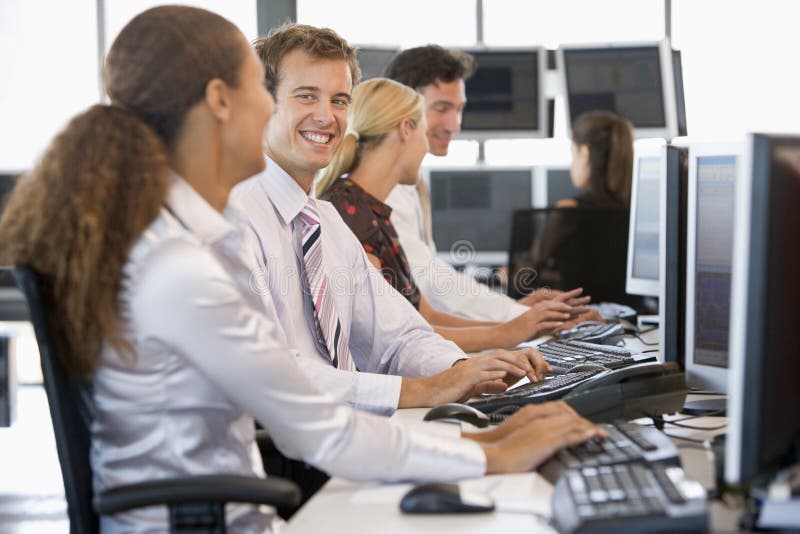Co-workers Working at Computers in Call Center Stock Photo - Image of ...