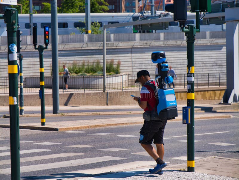 Stockholm, Sweden - Jun 26 2024: a Pedestrian with Google Maps Branded Backpack Camera ...