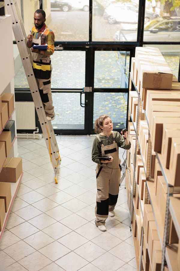 Stockroom Employee Scanning Boxes Using Store Scanner Stock Image ...