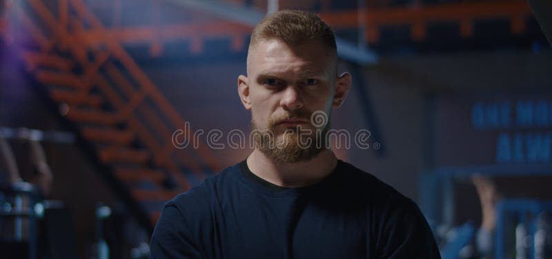 Stolid Young Man Looking at Camera Stock Image - Image of beard, stolid ...