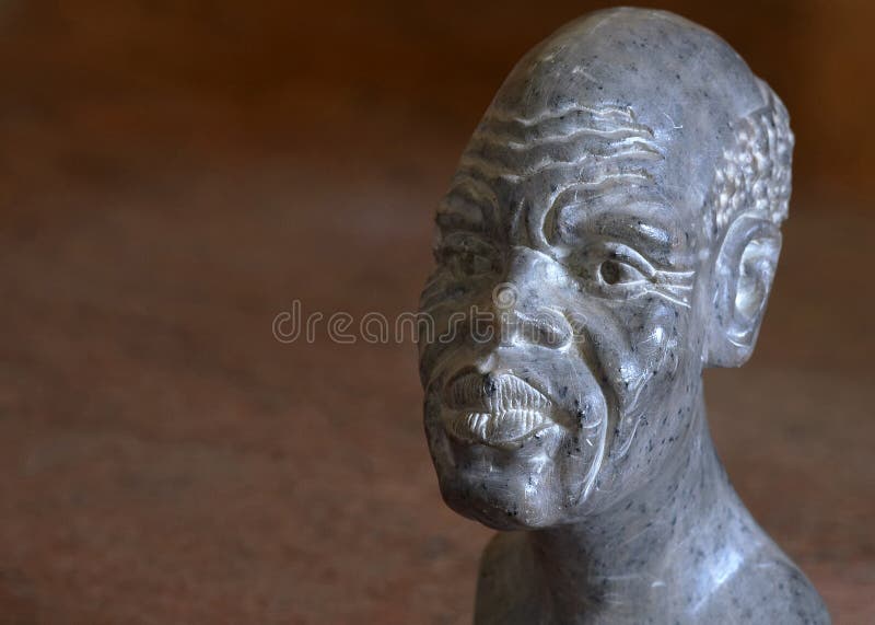 Stone African Head stock image. Image of closeup, constructed - 411833