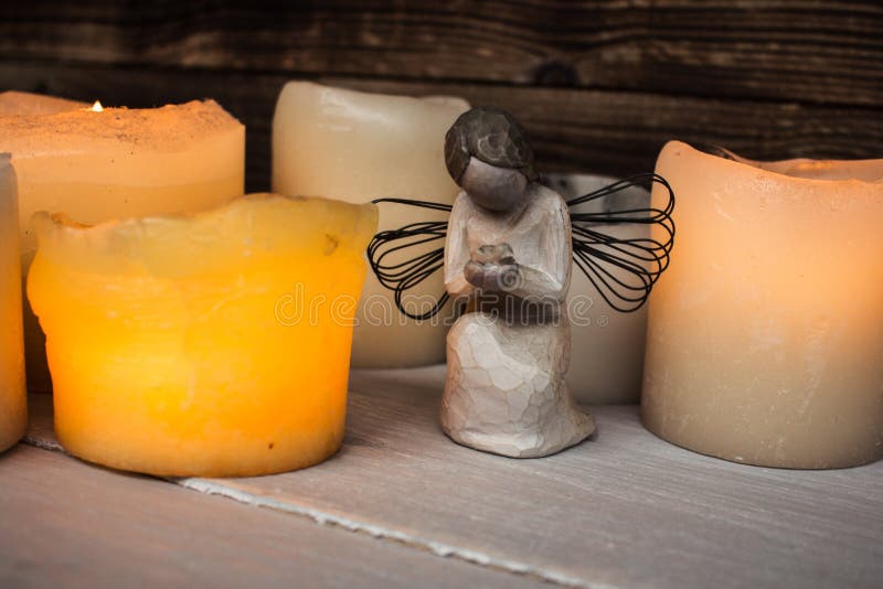 Stone Angel and Candle Light Stock Image - Image of decorative, clouds ...
