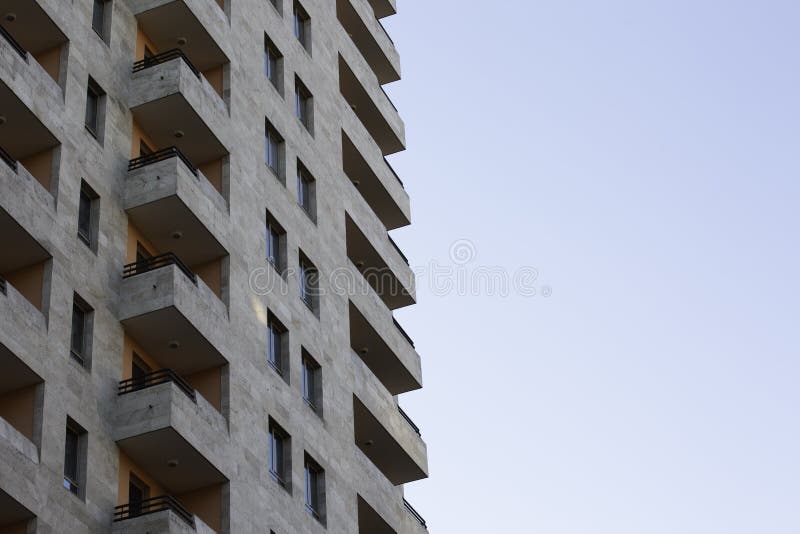 Stone Apartment Building Against the Sky Background Stock Photo - Image ...