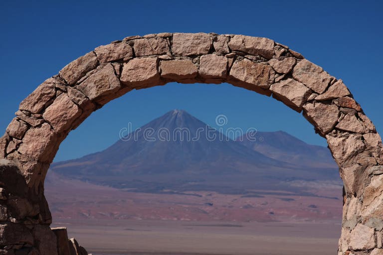 Stone Arch in Front of a Volcano in Chile Stock Image - Image of chile ...